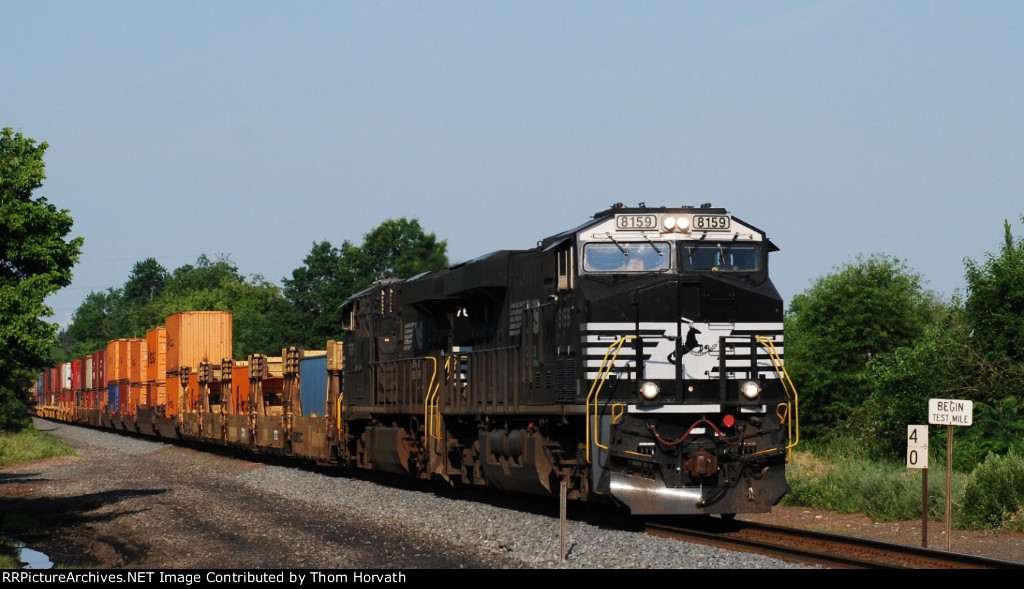 NS 22V's colorful COFCs heads east over the LEHL near MP 40